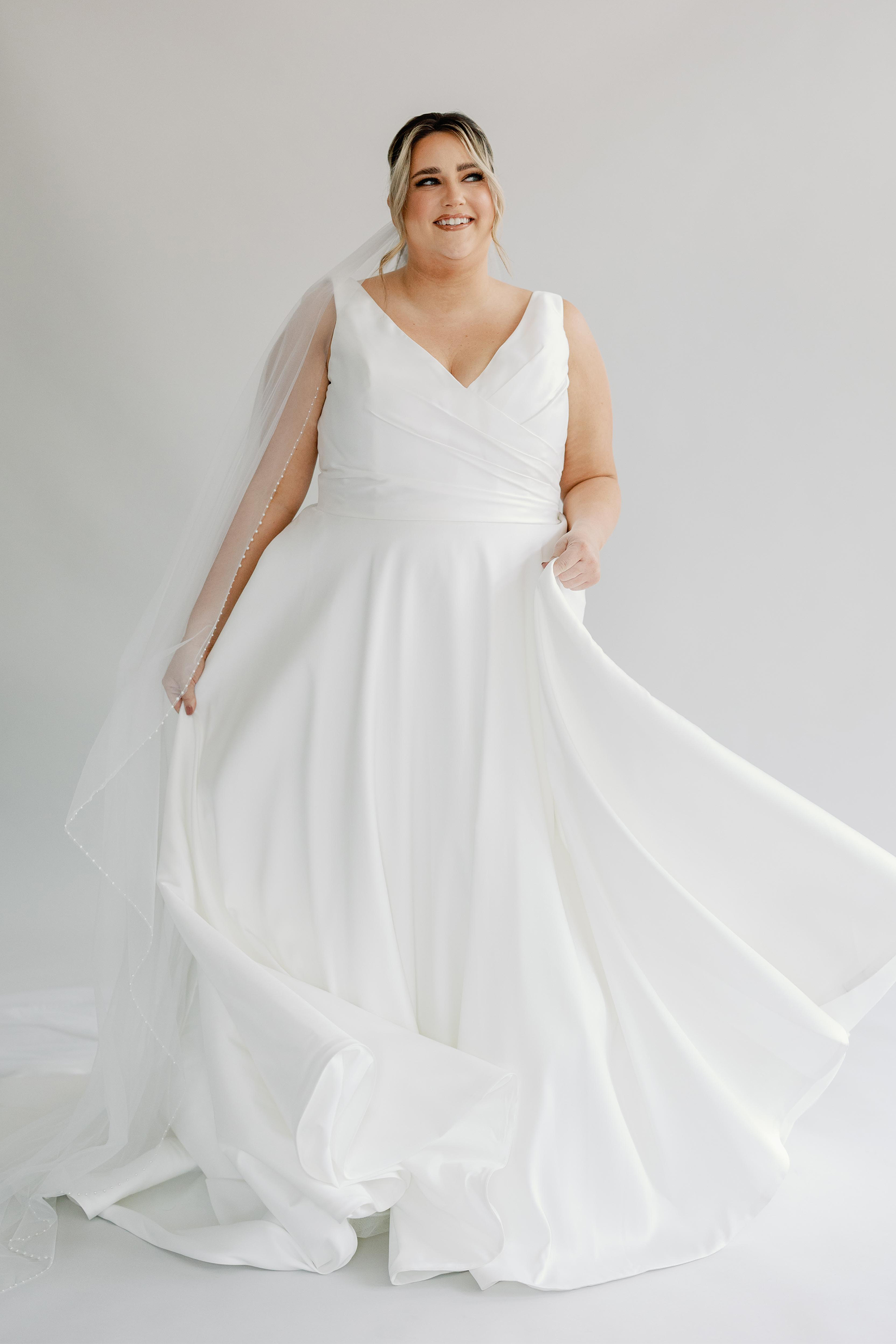 Style 44080PS: Asymmetric Draped Plus Size Ball Gown with Pockets ...